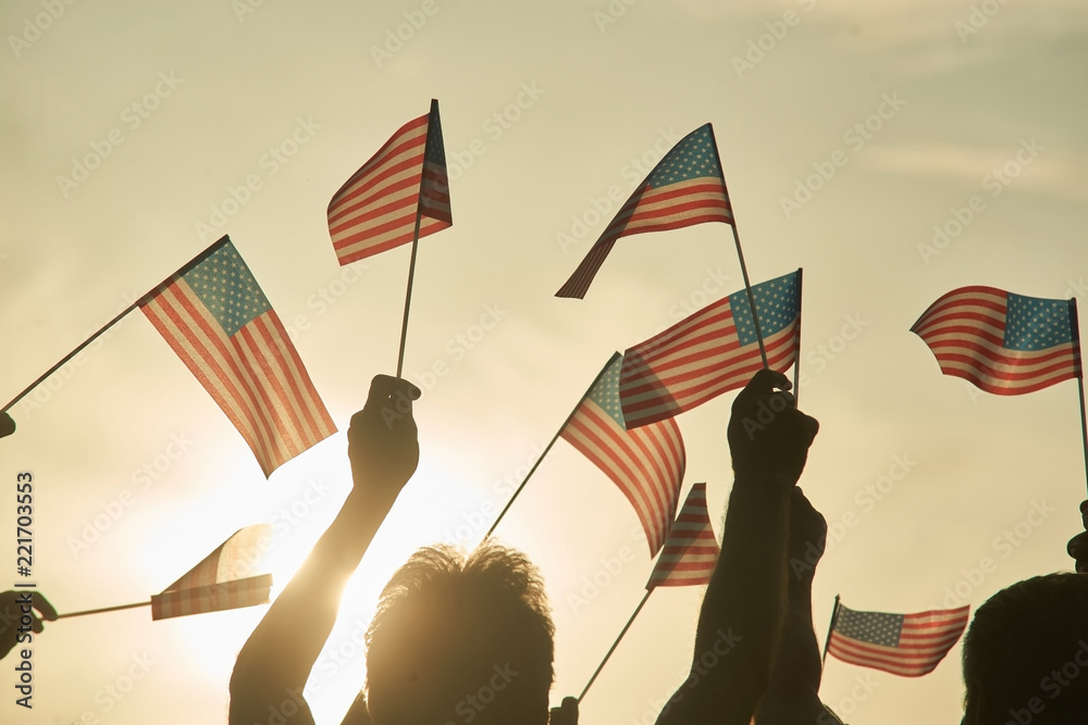 Waving american flags, close up. Morning sky background. Stock Photo ...