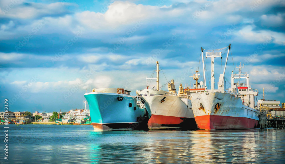 deep-sea commercial fishing trawlers park at pier. Stock Photo | Adobe ...
