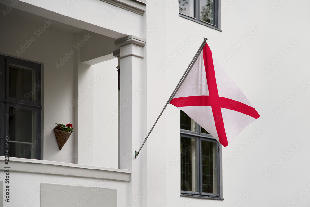 Alabama flag. Alabama flag hanging on a pole in front of the house ...