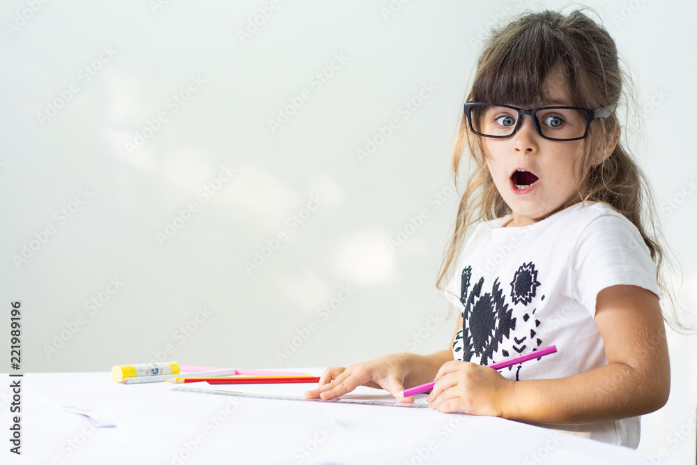 Oops! Shocked child learning in classroom or elementary school ...