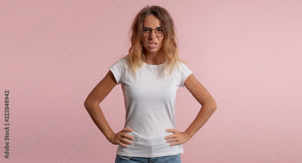 funny angry woman over pink background Stock Photo | Adobe Stock