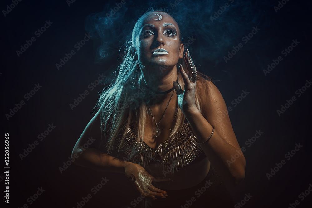 Strong tribal woman warrior, moon goddess or a priestess Stock Photo ...