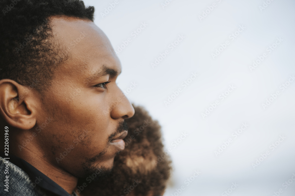 Serious dad with his son outdoors Stock Photo | Adobe Stock