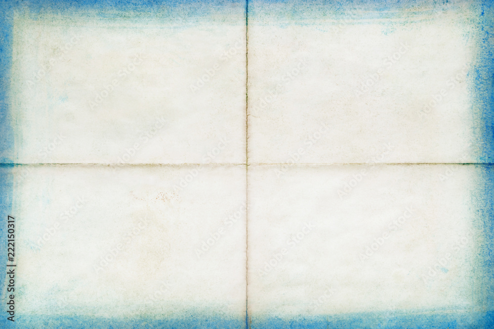 Blank old letter folded in four with blue edges, texture background ...