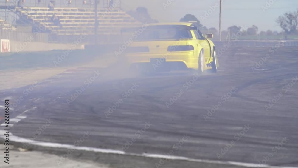 Filmed at 120fps exported at 60 fps Yellow Car Drifting corner Stock ...