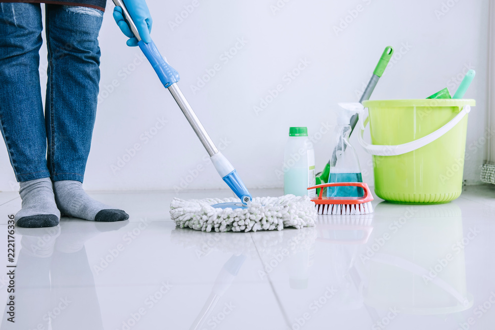 Housekeeping and cleaning concept, Happy young woman in blue rubber ...
