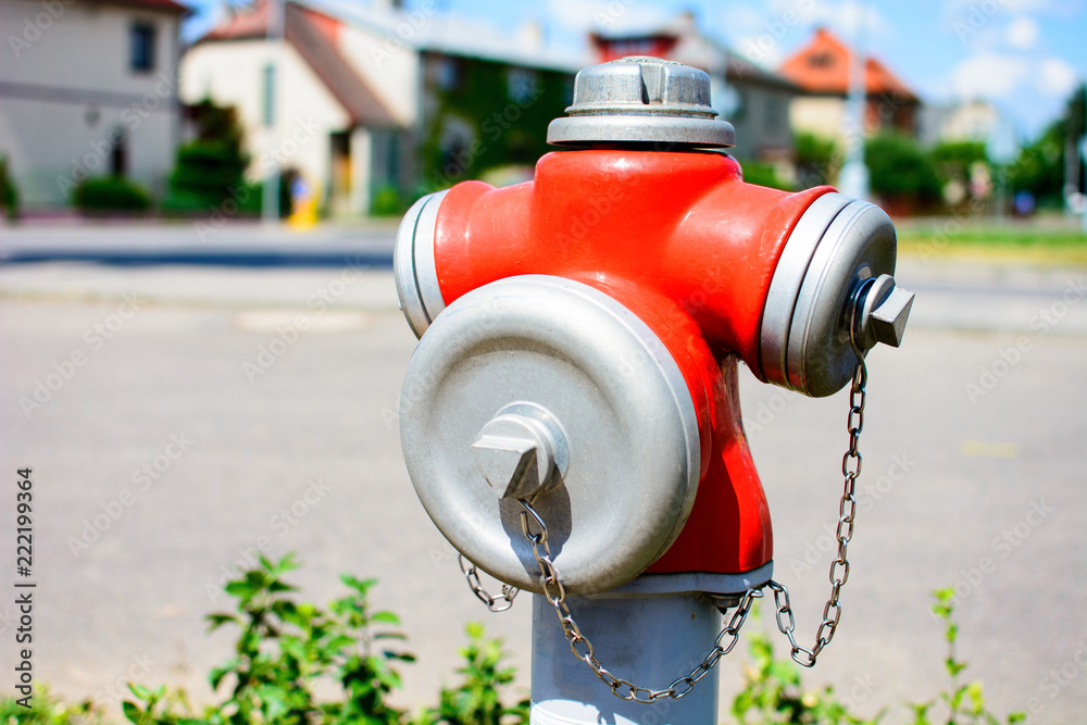 Red overground fire hydrant in the city center. Source of fire water ...