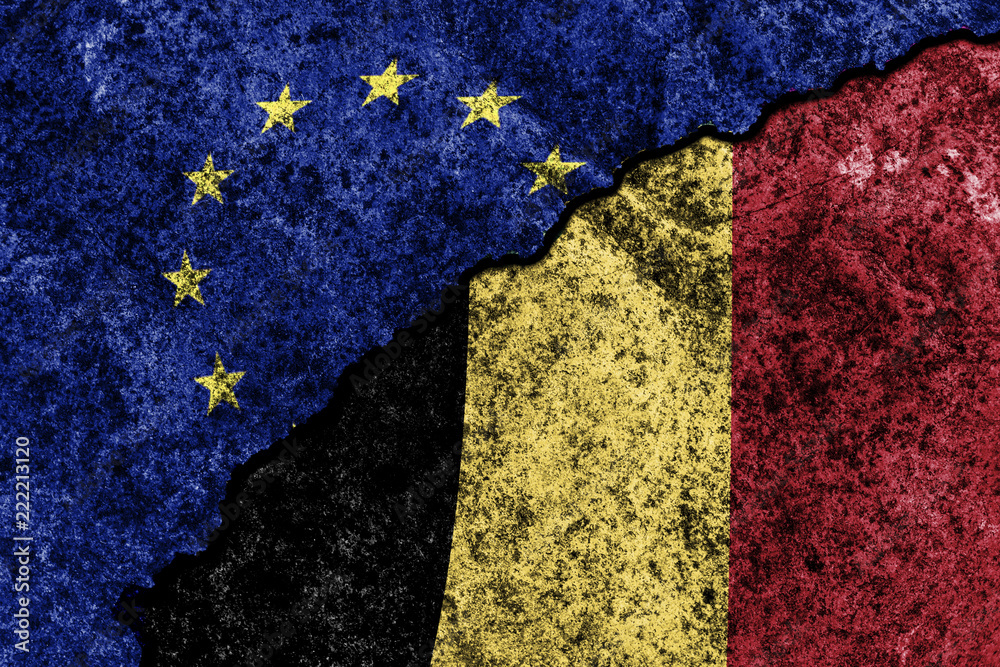 two flags of the European Union and Belgium On a cracked concrete slab ...