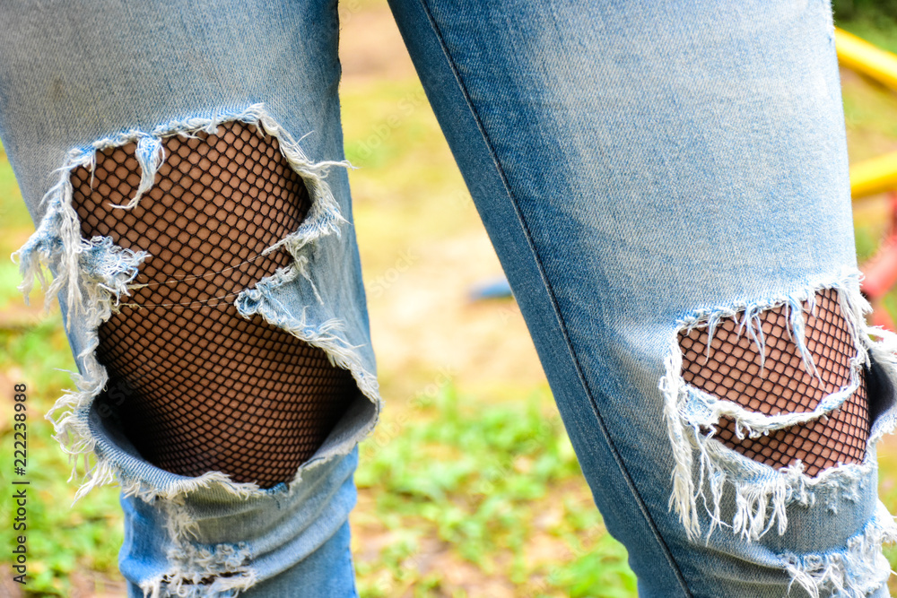 Torn jeans Stock Photo | Adobe Stock