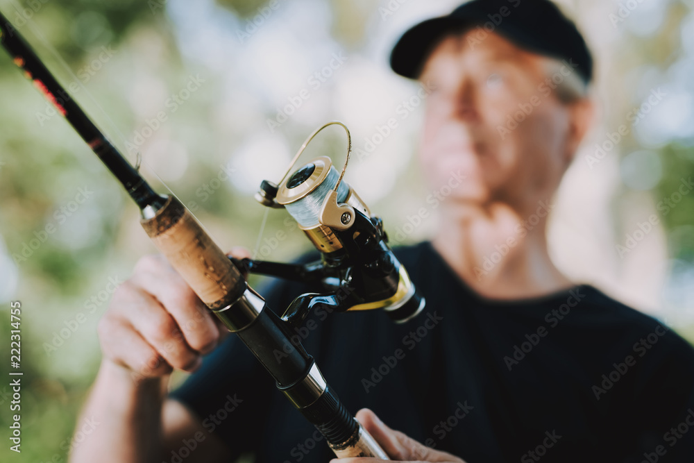 Old Man with Gray Hair Fishing on River in Summer. Stock Photo | Adobe ...