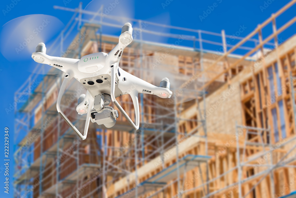Drone Quadcopter Flying and Inspecting Construction Site Stock Photo ...