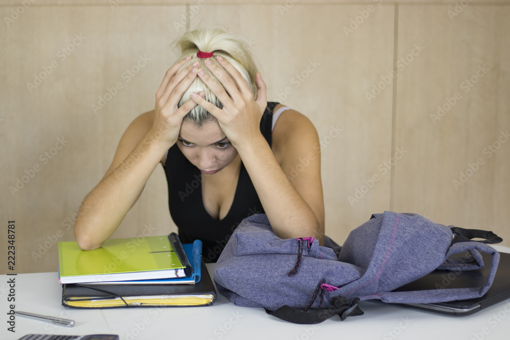 Frustrated student trying to understand notes Stock Photo | Adobe Stock