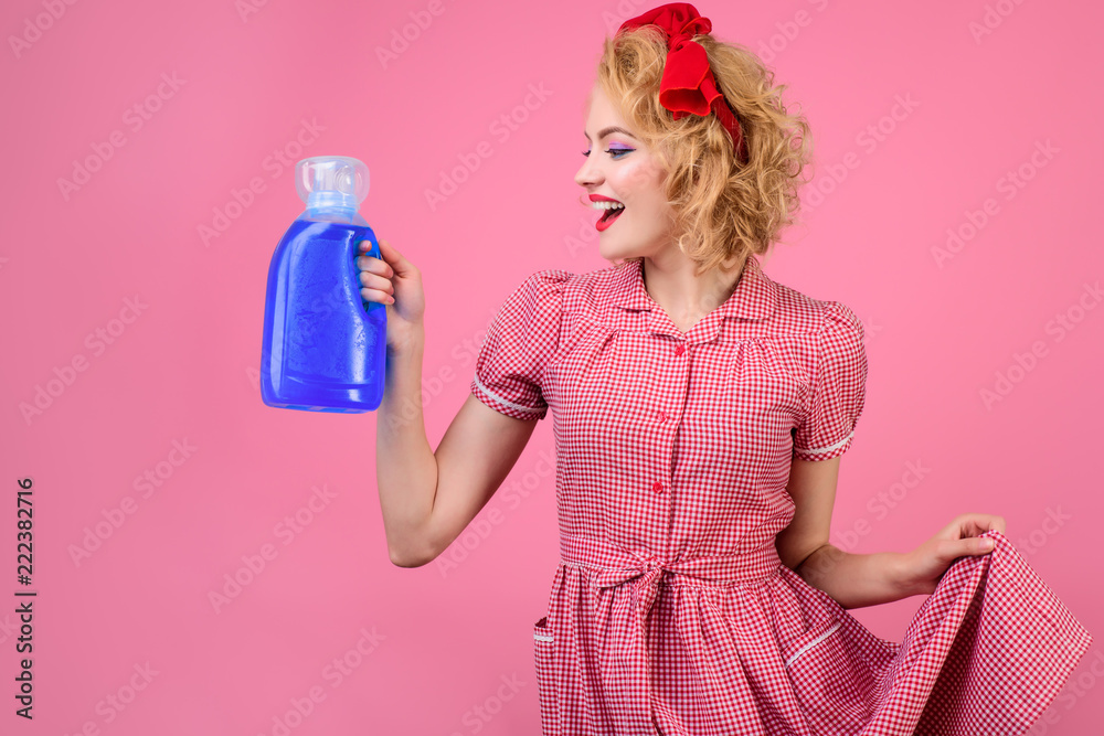 Cleaning. Portrait of pin up woman with cleaning products. Woman with ...