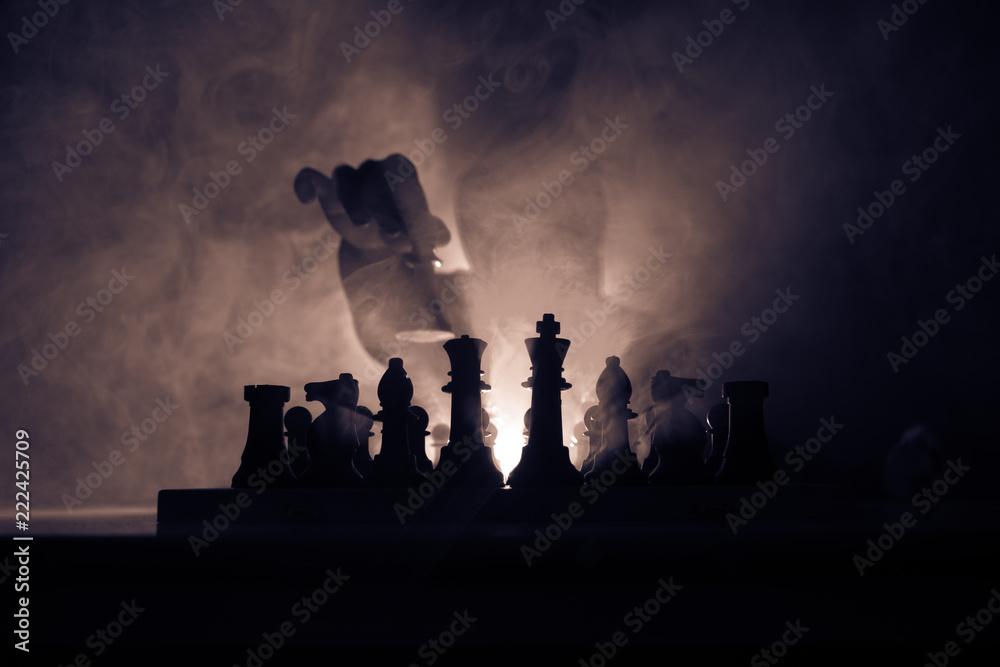 Man playing chess. Scary blurred silhouette of a person at the ...