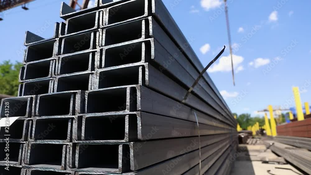 The metal channel laid in rows in the open metal warehouse, the large ...