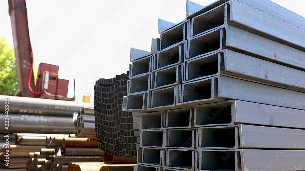 The metal channel laid in rows in the open metal warehouse, the large ...