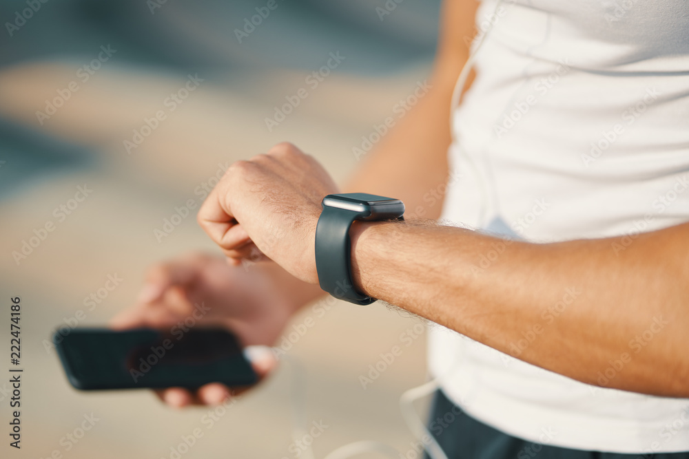 Person using smart watch close-up hands Stock Photo | Adobe Stock