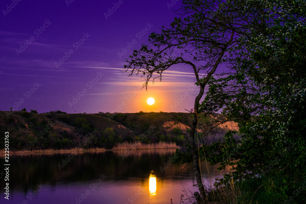Very beautiful and colorful night and evening landscapes over the river ...
