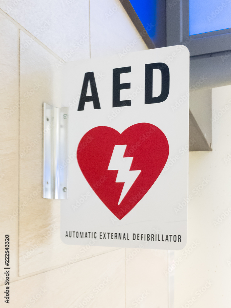 AED Automatic External Defibrillator sign on a wall with with a red ...