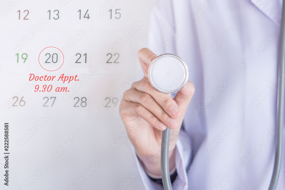 doctor appointment concept background with note on calendar and doctor ...