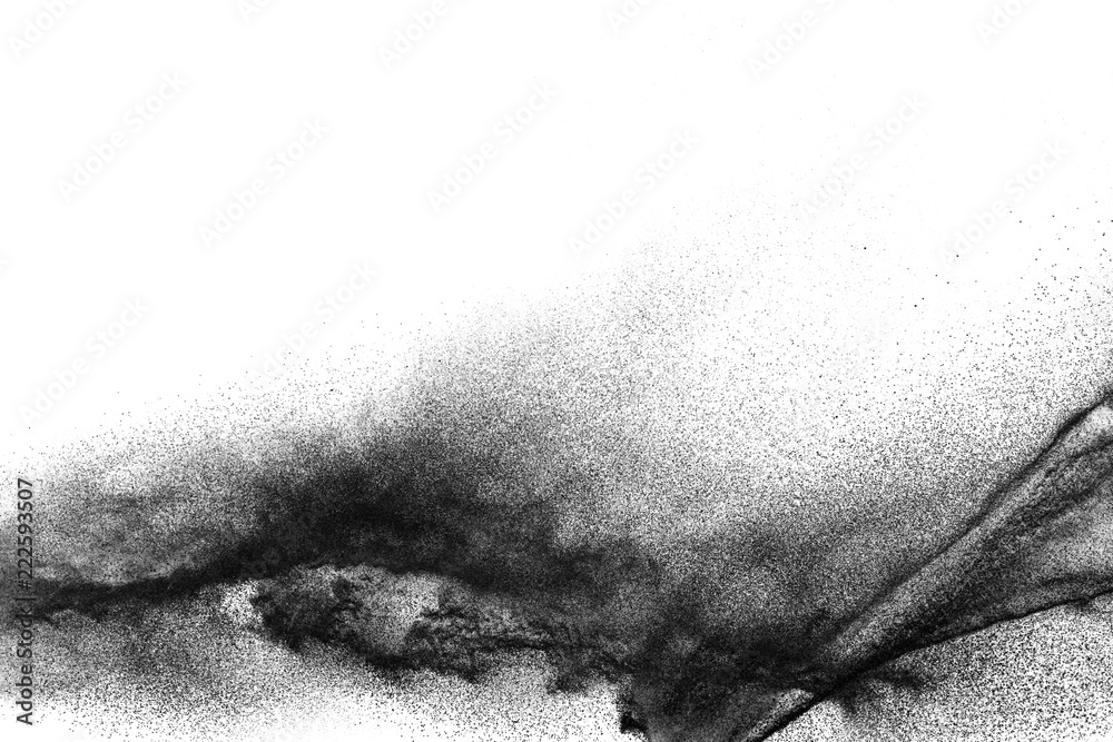 Black particles splattered on white background. Black powder dust ...