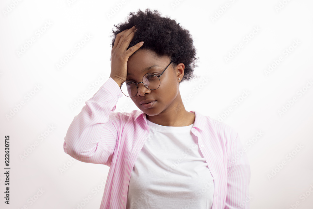 sick woman with a pain in her head. african girl touching her head ...