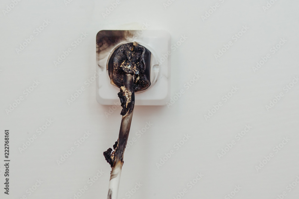 Electrical short circuit. Failure caused by burning wire and rosettes ...