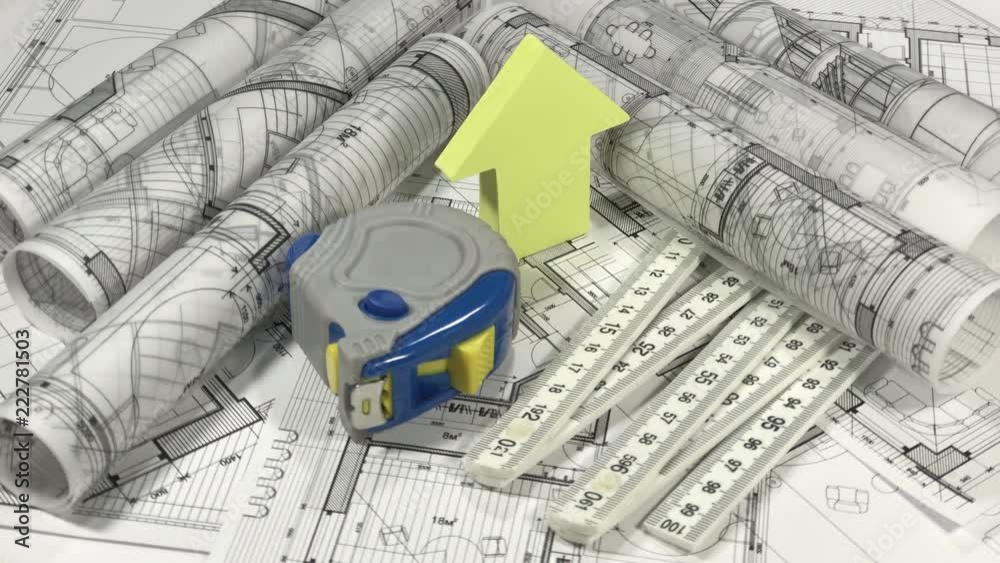 Blueprints - rolls of architectural drawings, notebook, yardstick ...