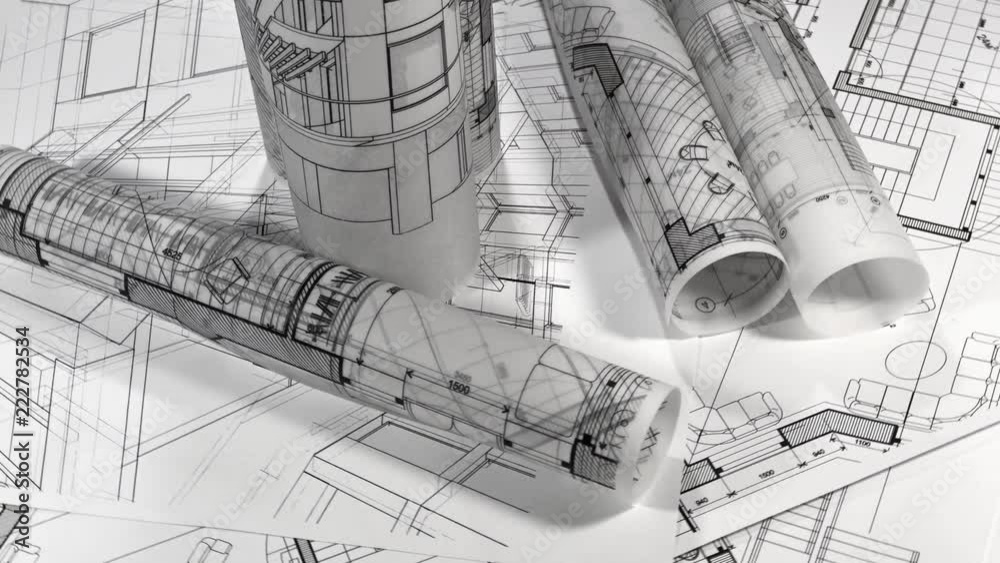 Stockvideo Blueprints - rolls of architectural drawings smoothly rotate ...