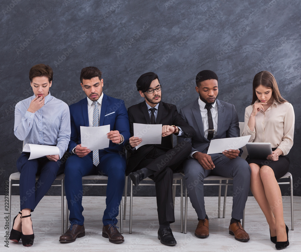Multiethnic job candidates preparing for job interview Stock Photo ...