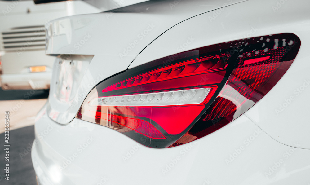 Closeup modern luxury white Back lights headlight and head lamp of ...