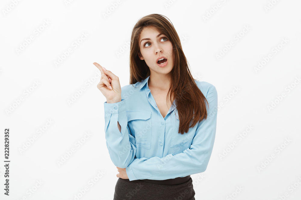 Dreamy empty-headed cute girl with brown hair, standing with opened ...