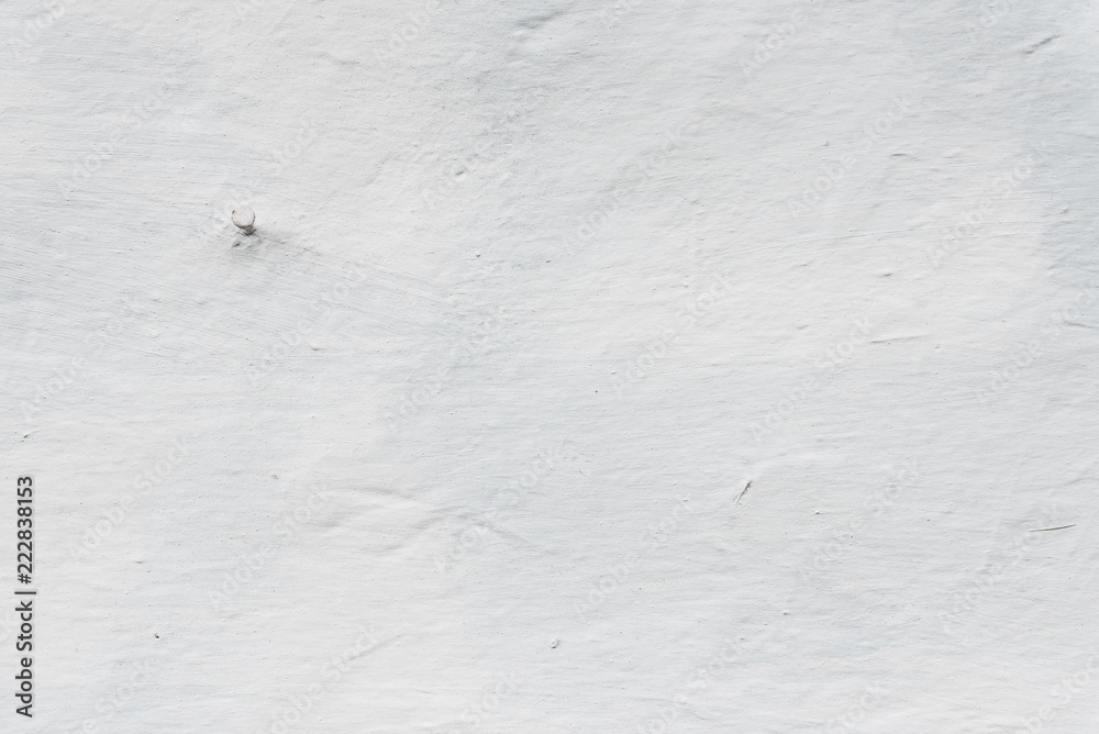 Nail in the wall, whitewashed wall of adobe house, retro style ...