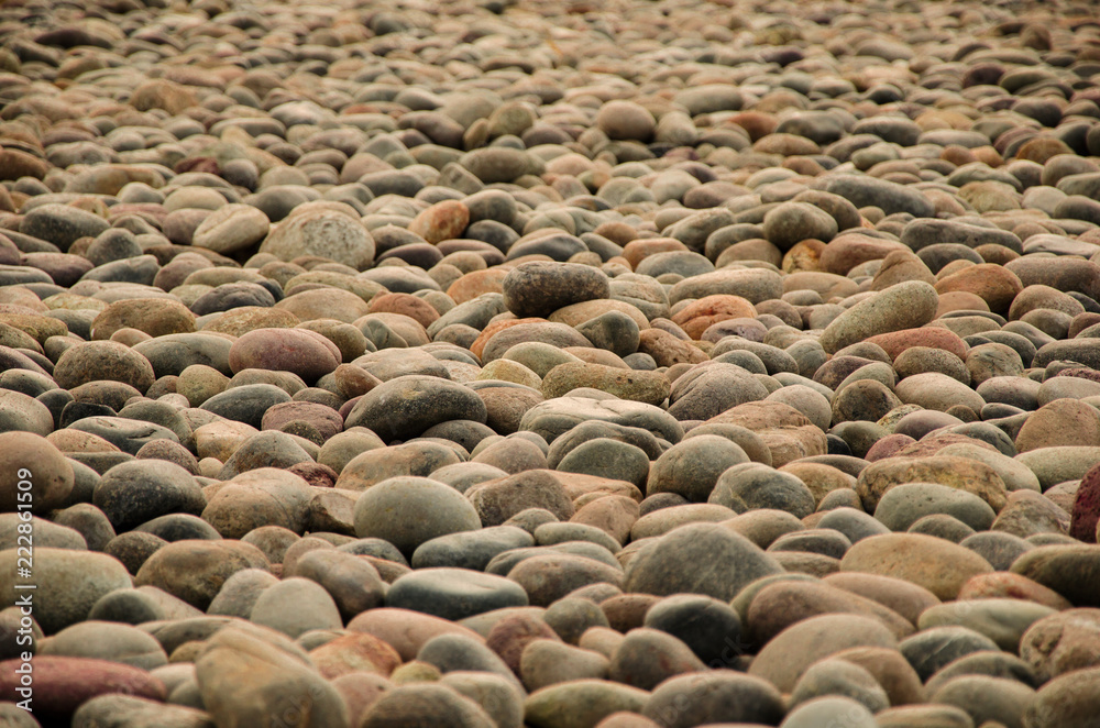 fondo de rocas de colores en playa Stock Photo | Adobe Stock