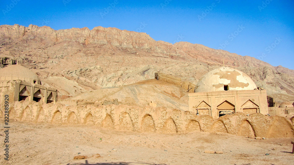 Traditional buildings in Tuyoq, a traditional uyghur village near the flaming mountains in the ...