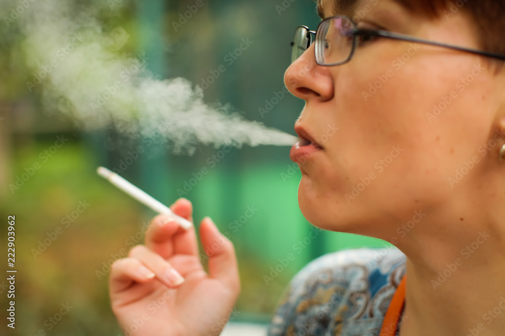 Exhaling Cigar Smoke