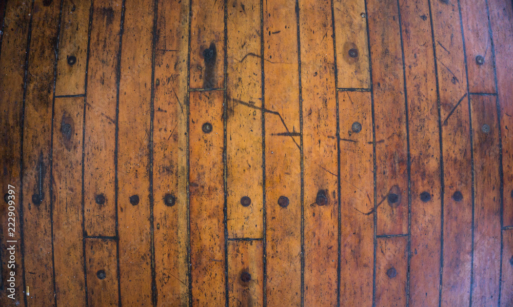 wooden texture background with brown yellow color as floor of the ship ...
