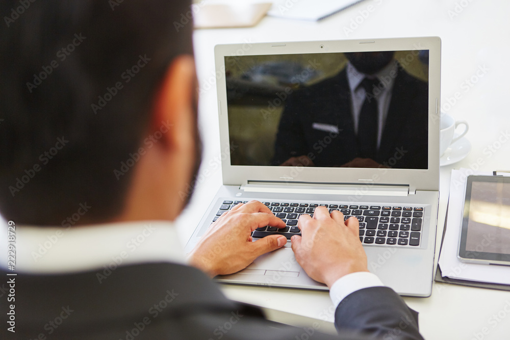 Mann programming with laptop Stock Photo | Adobe Stock