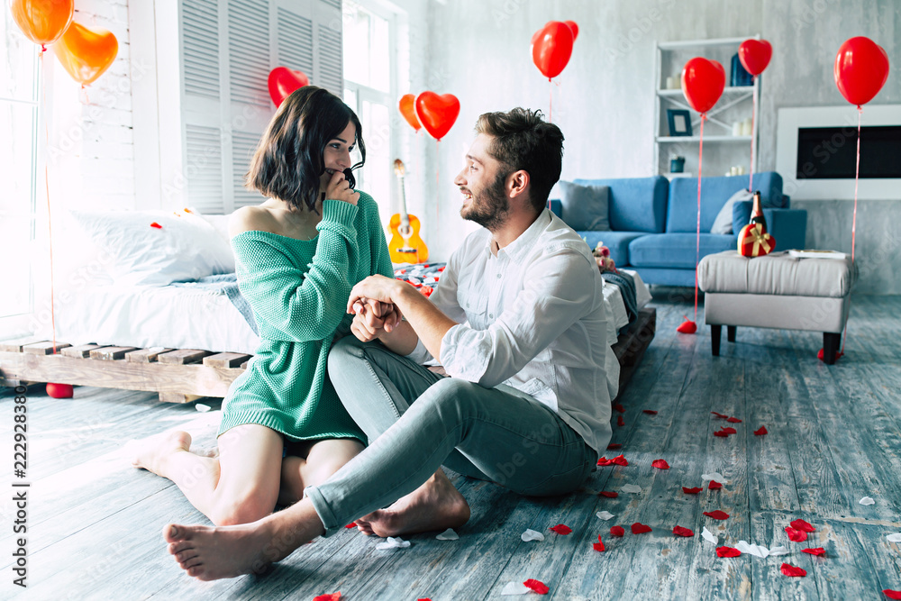 Beautiful young tender lovely couple are kissing and hugging each other ...