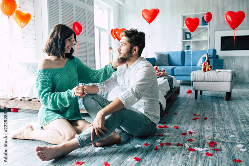 Beautiful young tender lovely couple are kissing and hugging each other ...