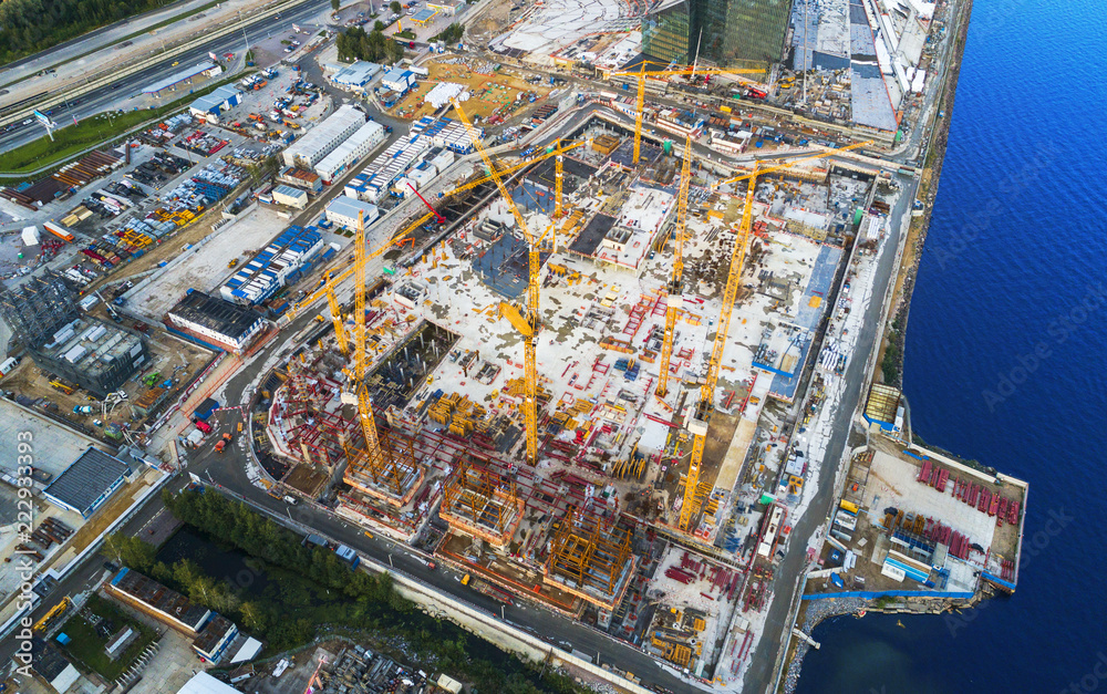 Aerial view of a Construction crane tower. Top view Crane and building ...