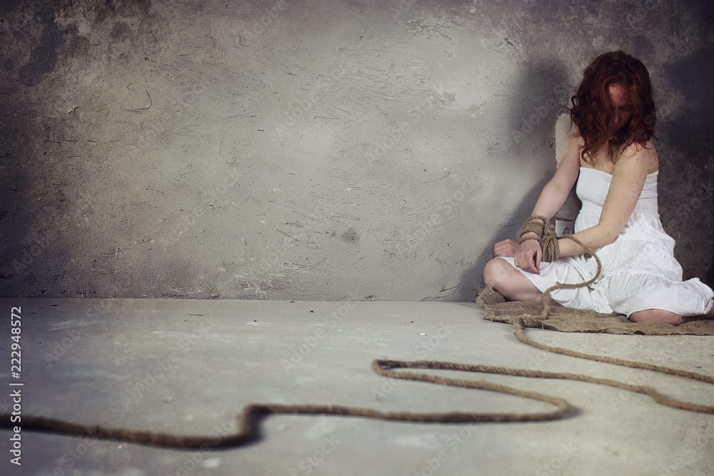 Young Girl Tied Up On The Floor The Abducted Girl The Victim O Stock