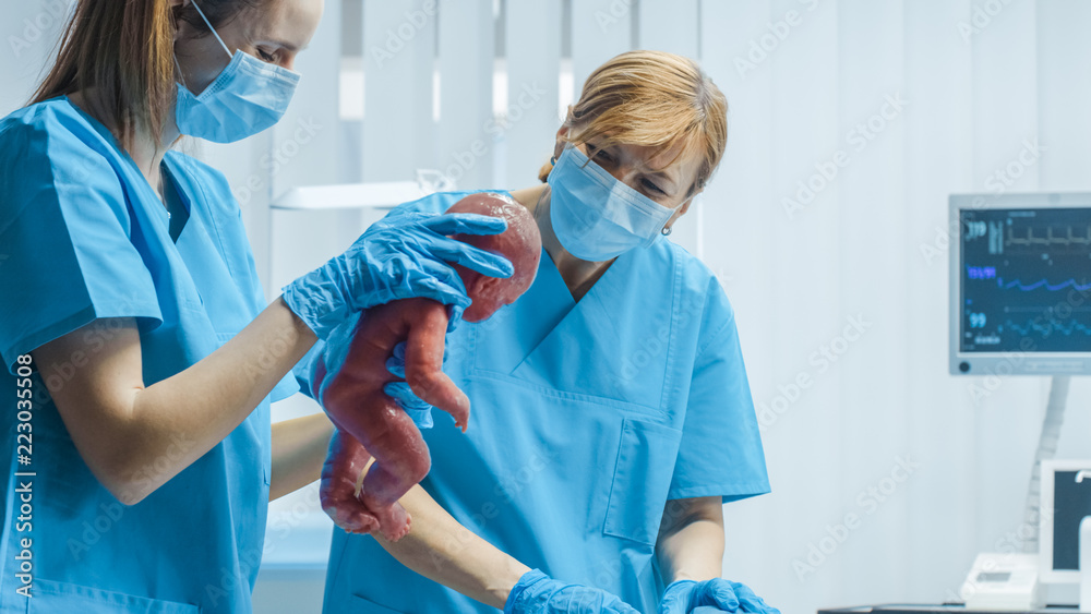 Baby Coming Out Of Woman