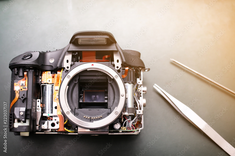 Repair and maintenance camera Single Lens Reflex Stock Photo | Adobe Stock
