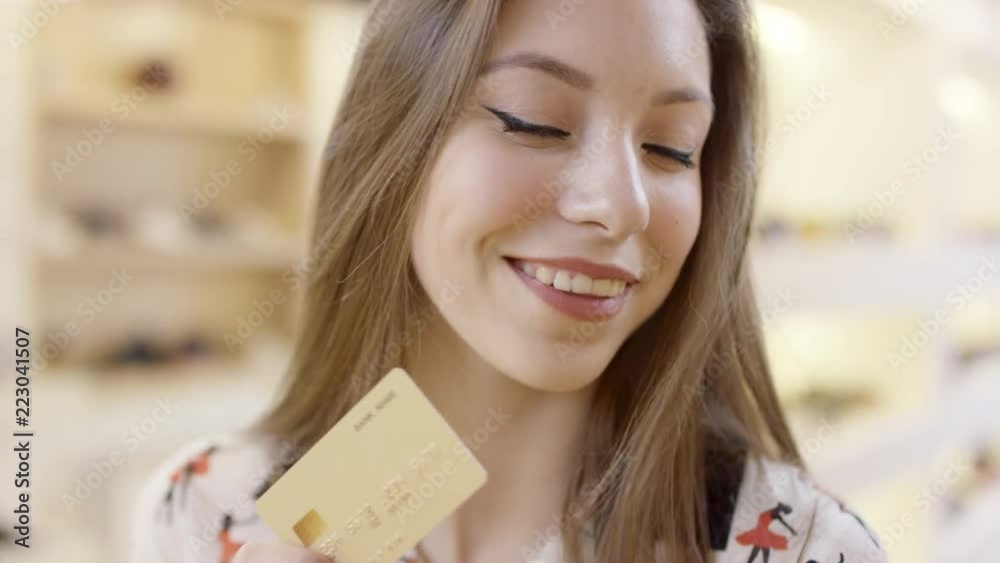 Portrait of a happy young girl expressing her excitement for using a ...