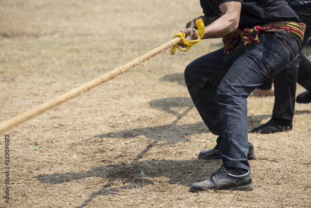 Group of people, team pulling line. Teamwork Concept. Stock Photo ...