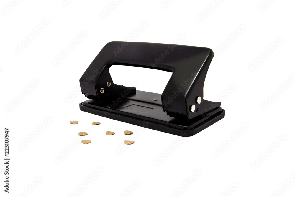 Black paper hole puncher, office tool equipment that is used to create ...