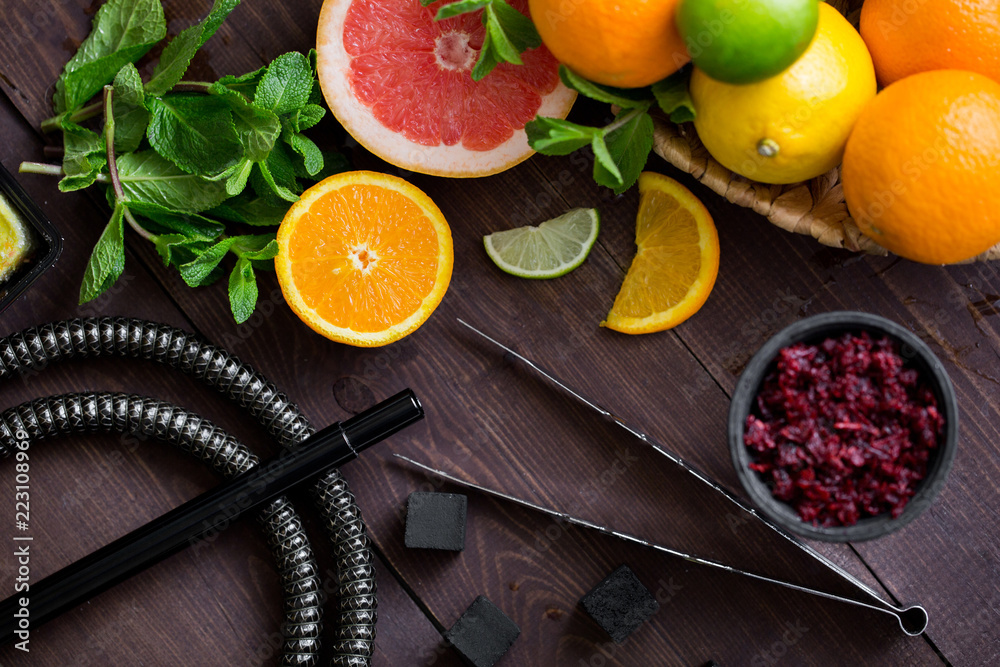 Hookah with smoke to relax and rest people. Citrus fruits and mint ...