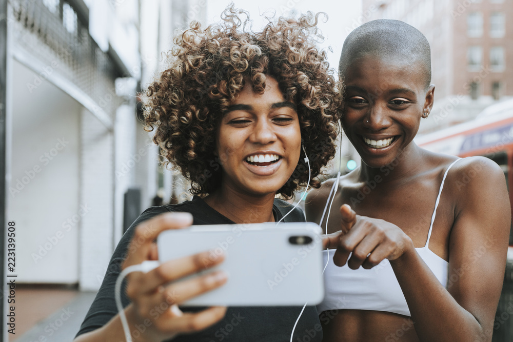 Cute girls making a video call Stock Photo | Adobe Stock