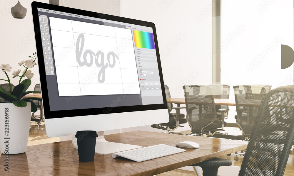 computer with logo design software screen on modern business office ...